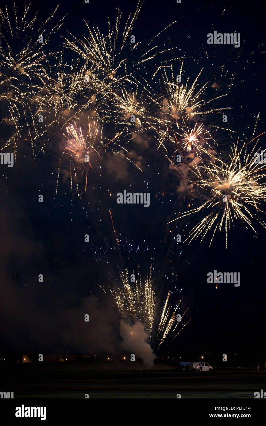 Multiple golden fireworks Stock Photo - Alamy