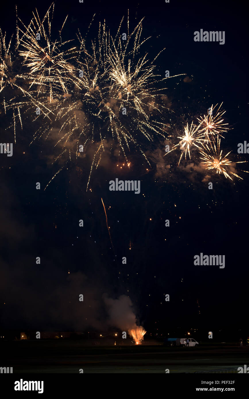 Multiple golden fireworks Stock Photo - Alamy