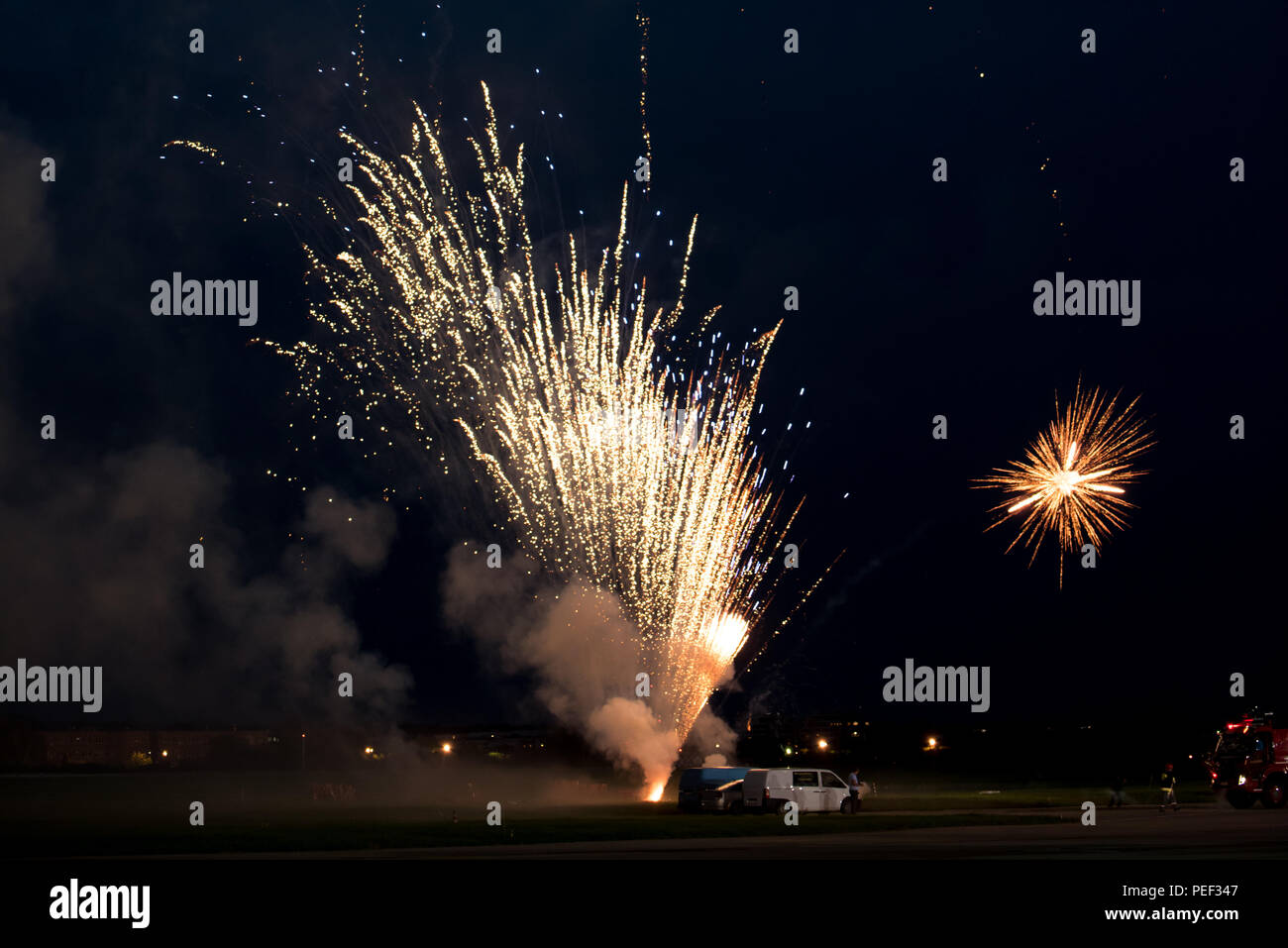 Multiple golden fireworks Stock Photo - Alamy