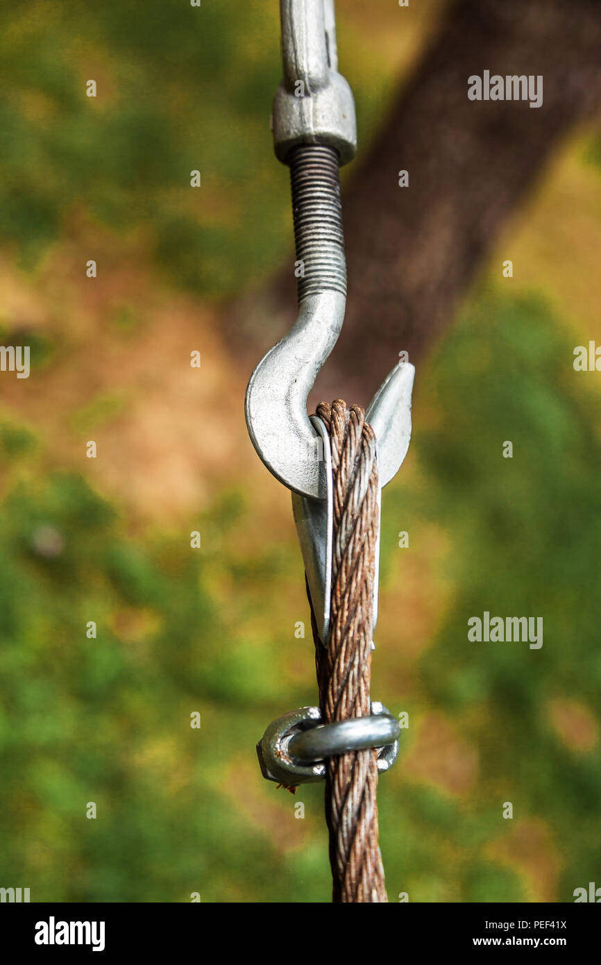 Fastening of a cable and a metal hook Stock Photo - Alamy
