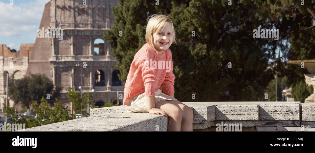 happy modern child not far from Colosseum Stock Photo - Alamy