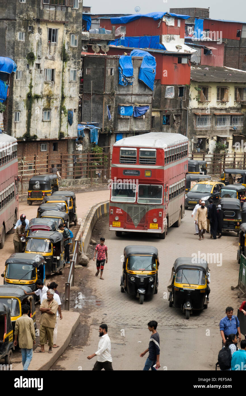 Double decker bus and auto rickshaws on Station road, Bandra, Mumbai ...