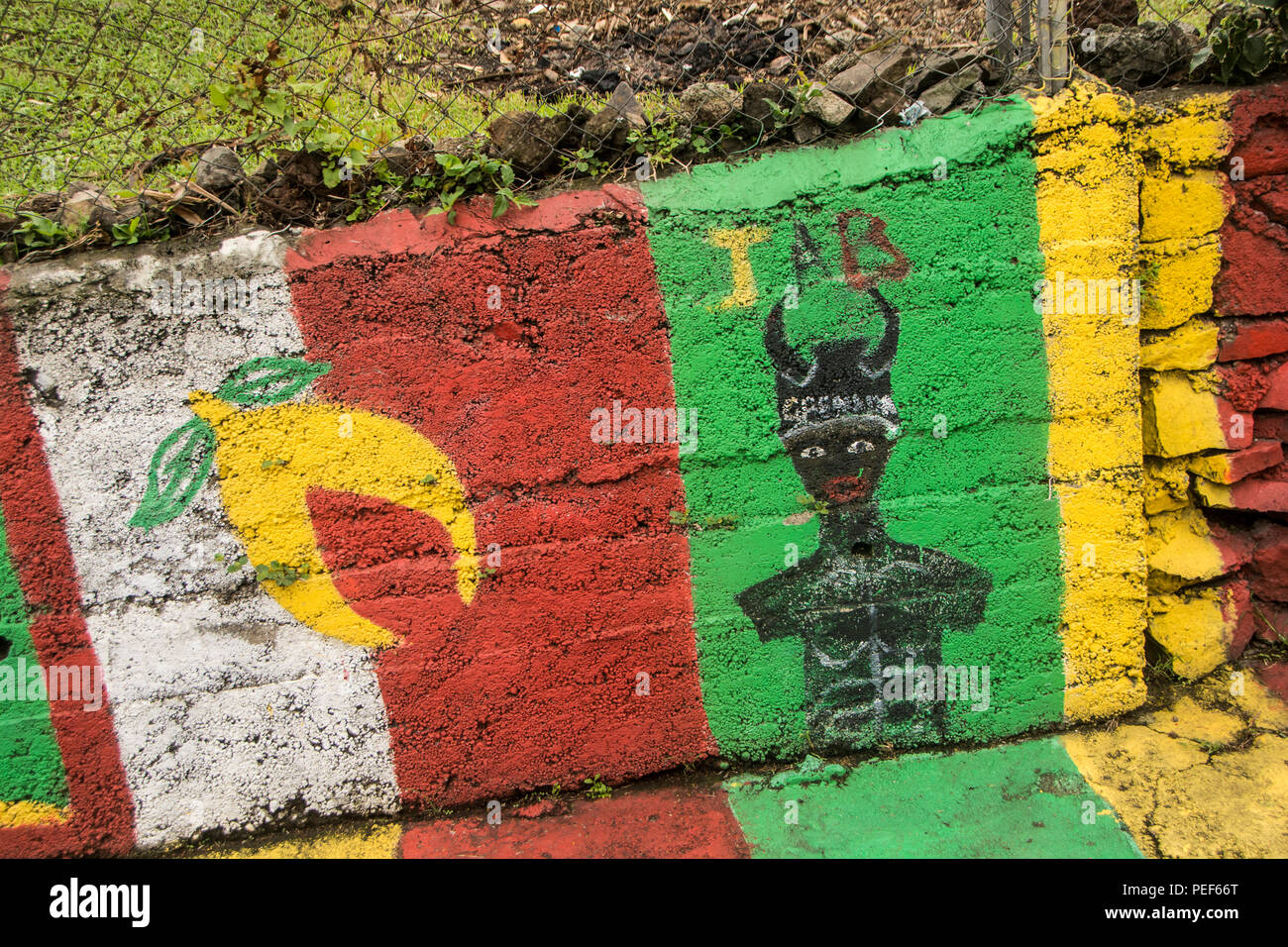 A colorful street curb, Grenada Island Stock Photo - Alamy