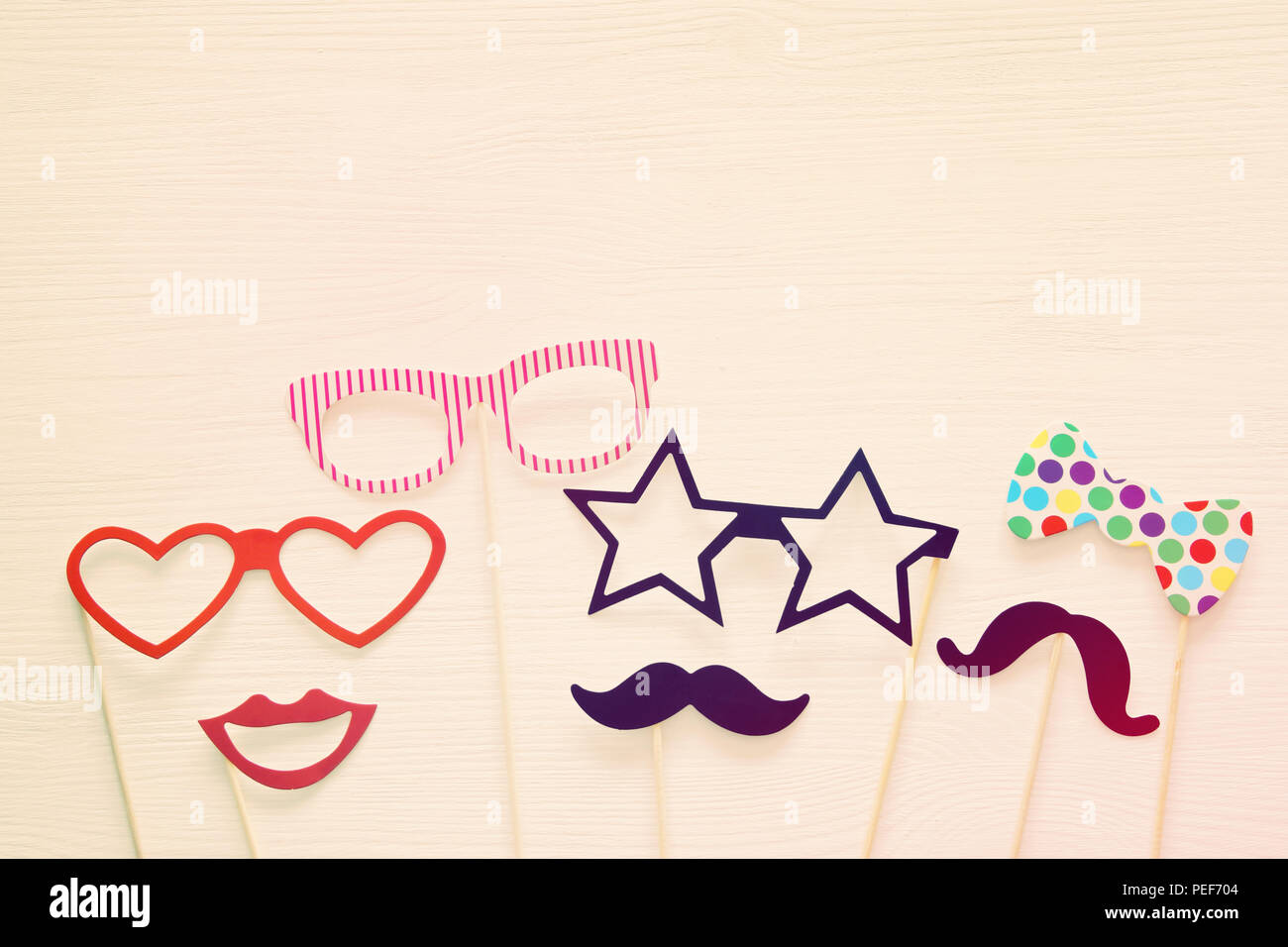 Top view image of funny and colorful photo booth props for party over ...