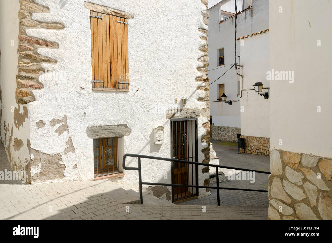 typical street of a village in Spain with white houses Stock Photo - Alamy