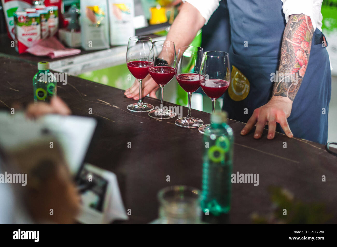 championship among coffee houses, members of teams show barista's skill ...
