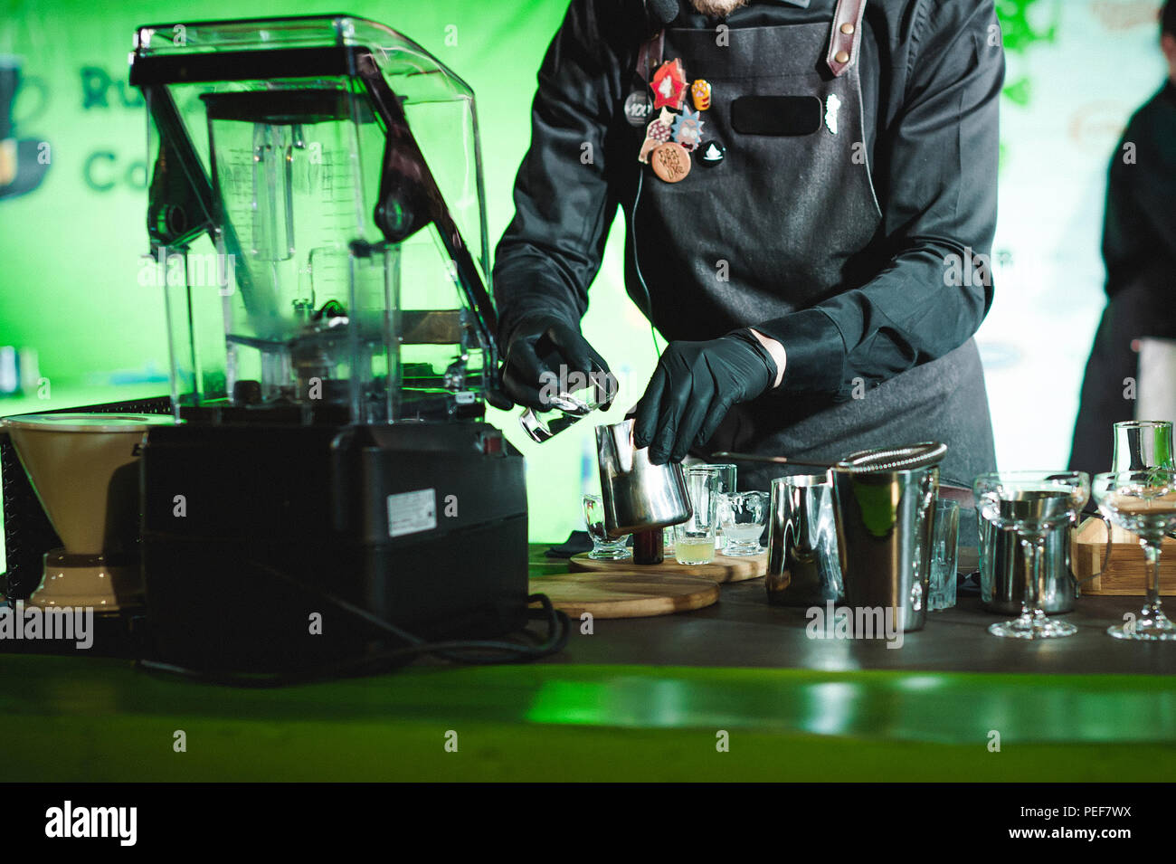 championship among coffee houses, members of teams show barista's skill ...