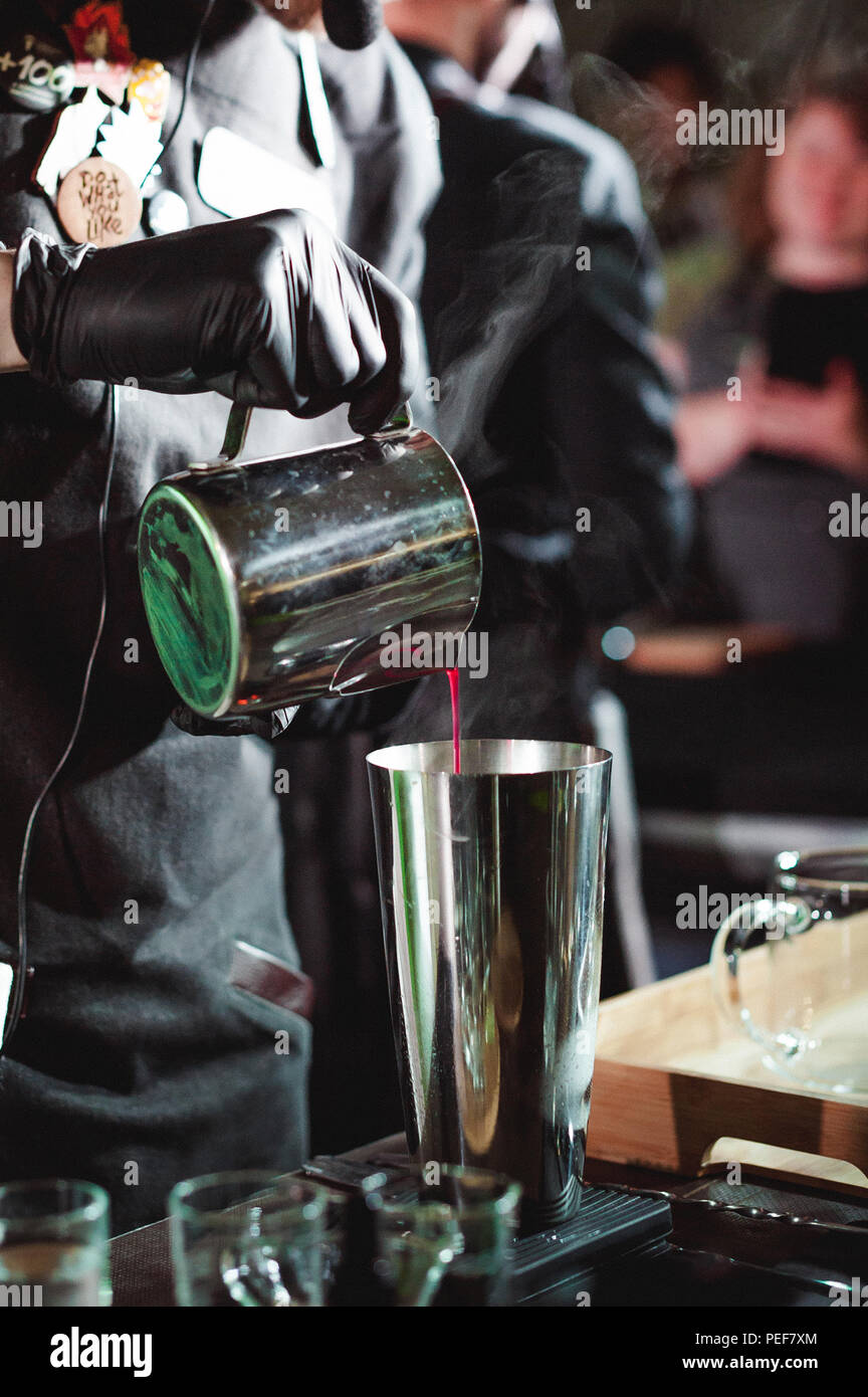 championship among coffee houses, members of teams show barista's skill ...