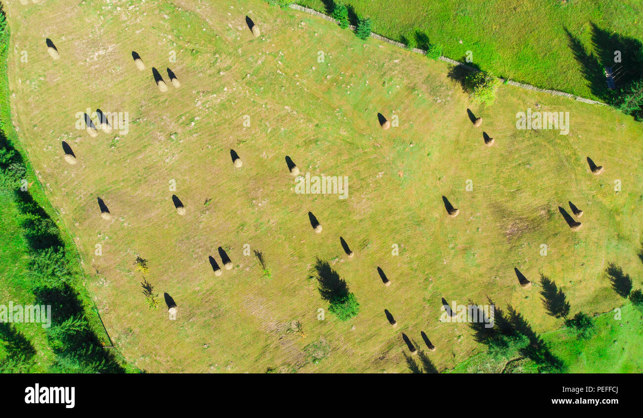 aerial view of hay stacks in Romania countryside Stock Photo - Alamy