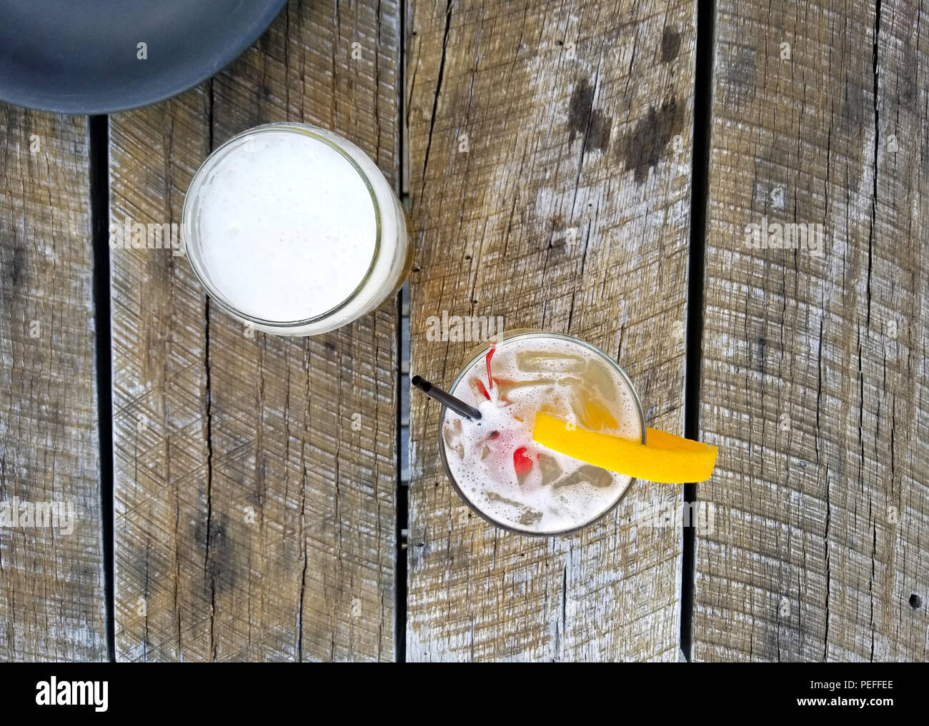 Two drinks on a wooden rustic table. bar table. top view Stock Photo ...