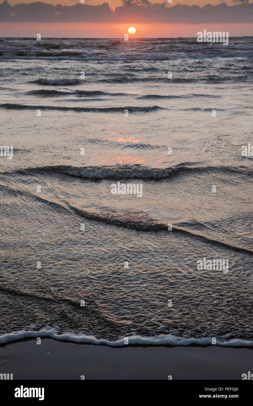 Beach on Texas Gulf Coast at sunrise Stock Photo - Alamy