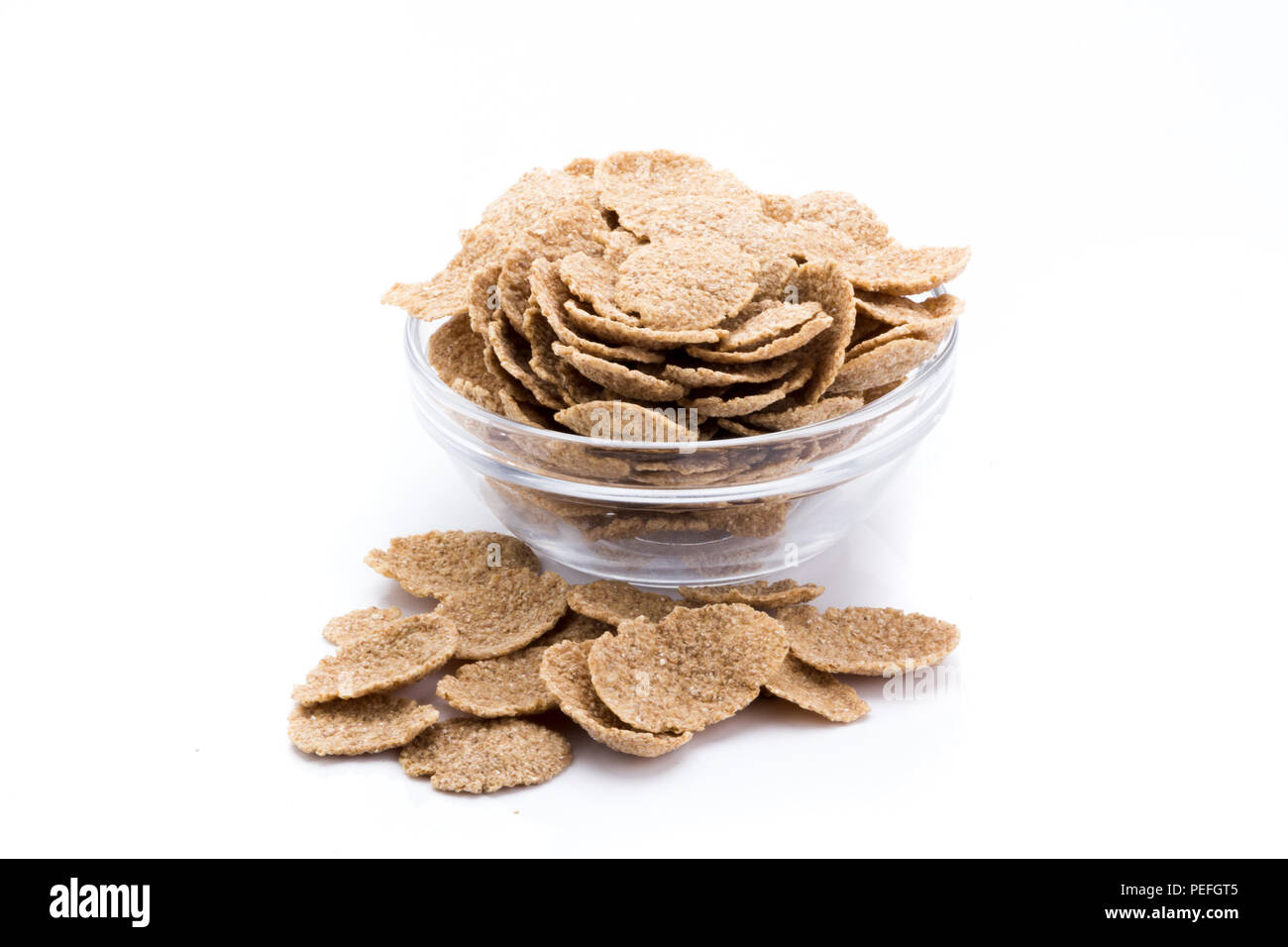 Container with wheat flakes, whole grain food with a lot of fiber ...