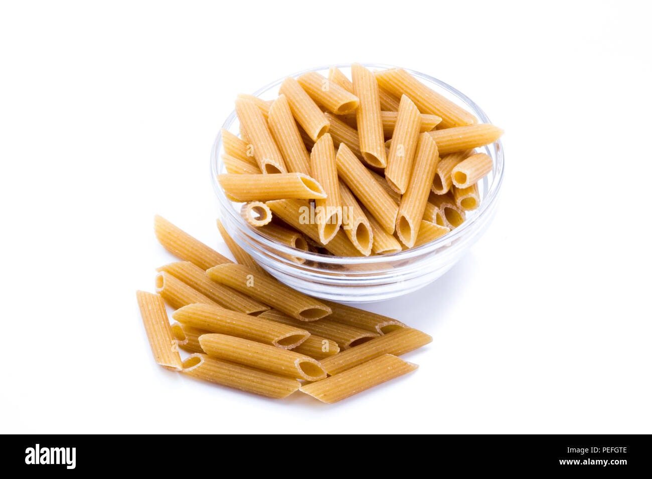 Container with wholemeal pasta isolated on a white background Stock ...