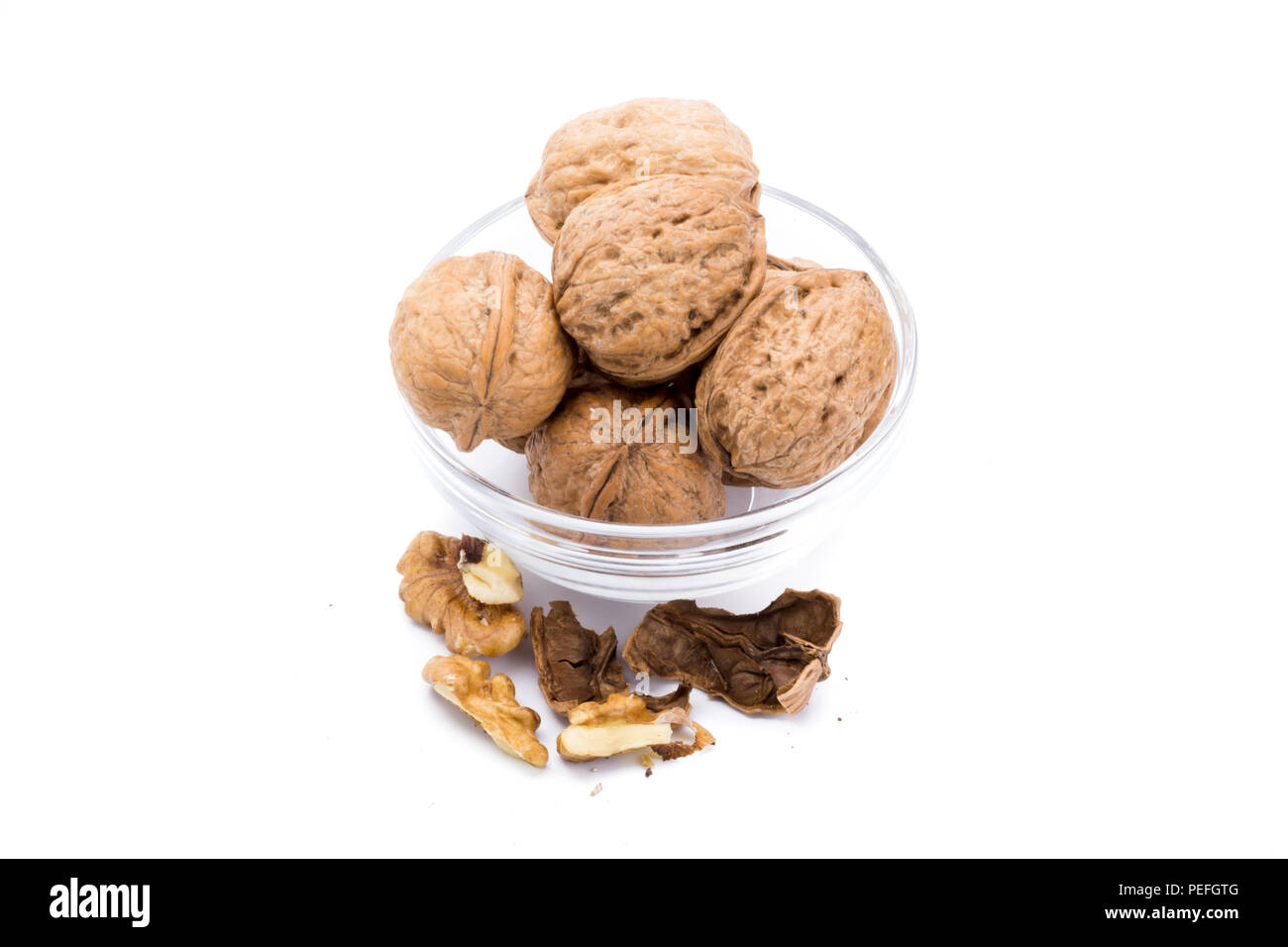 Container with large nuts isolated on a white background Stock Photo ...
