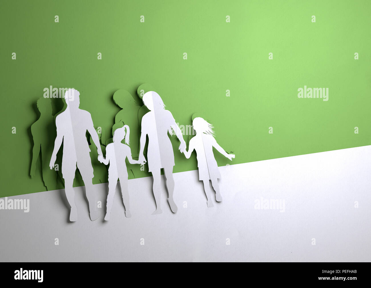 Folded Paper art origami. A father and mother with children crafted ...