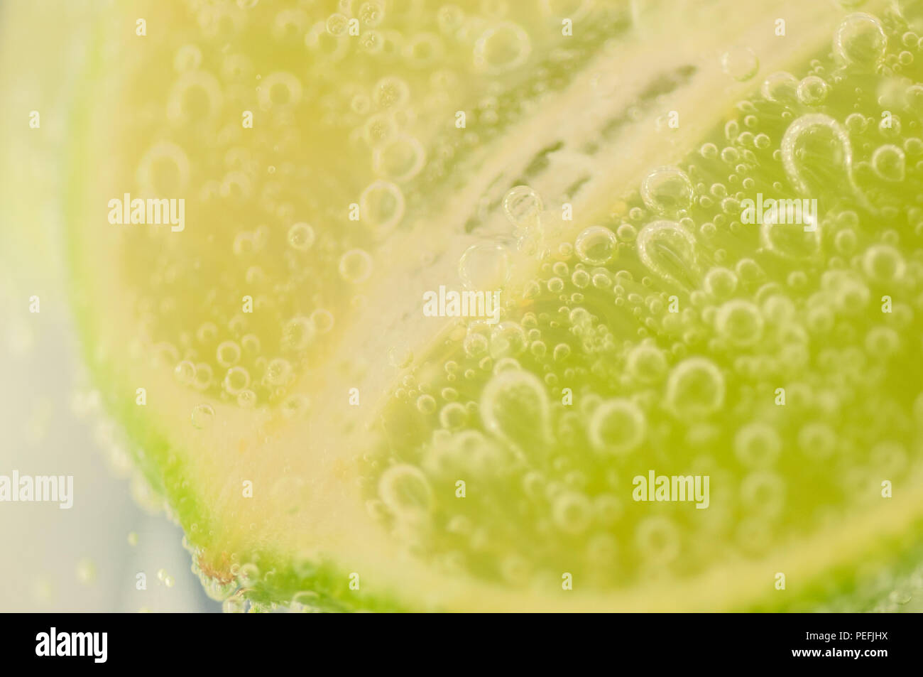 beautiful macro of lime and bubble water for a fresh cocktail Stock ...