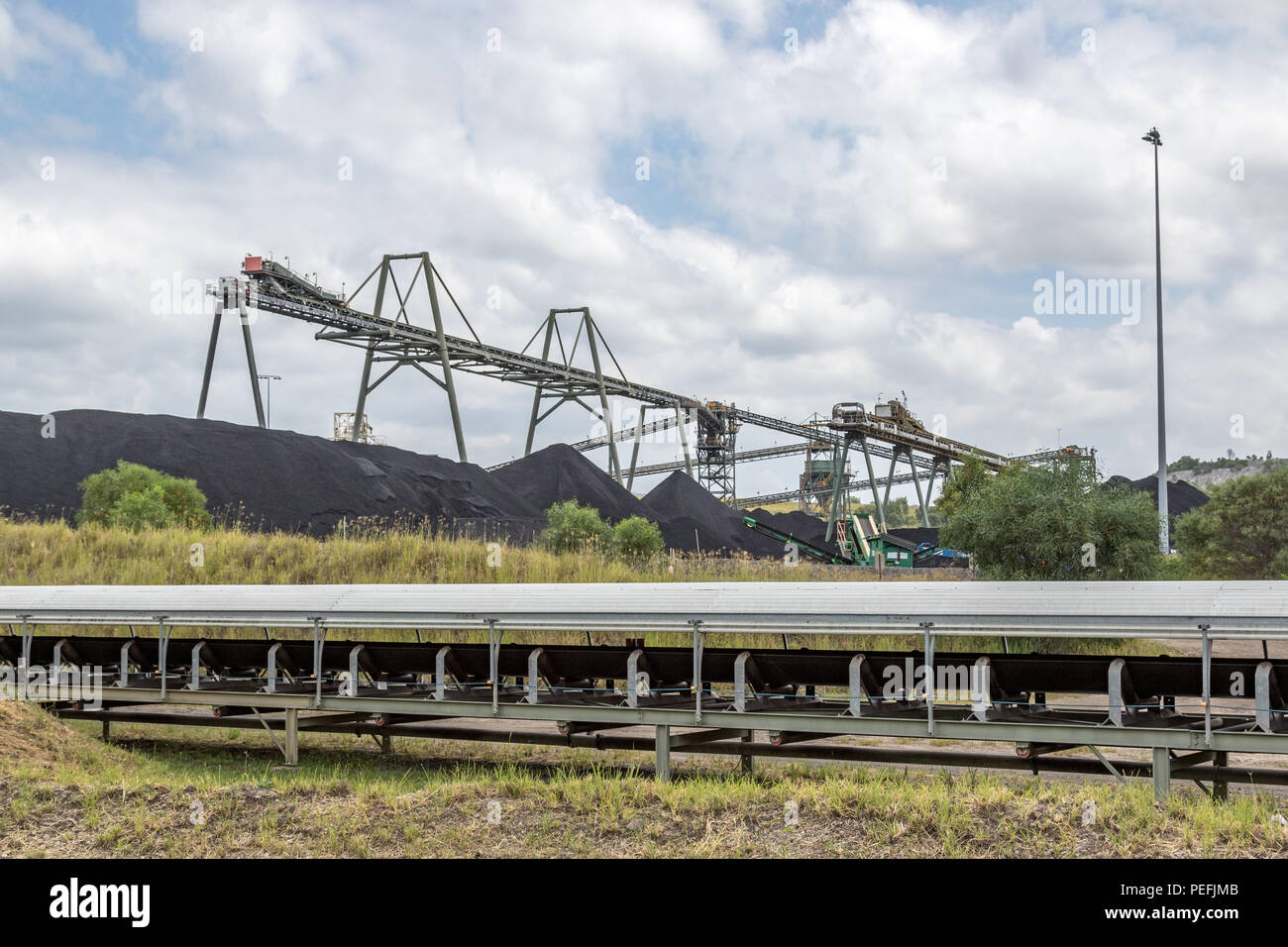 Coal mine conveyor and stockpile Stock Photo - Alamy