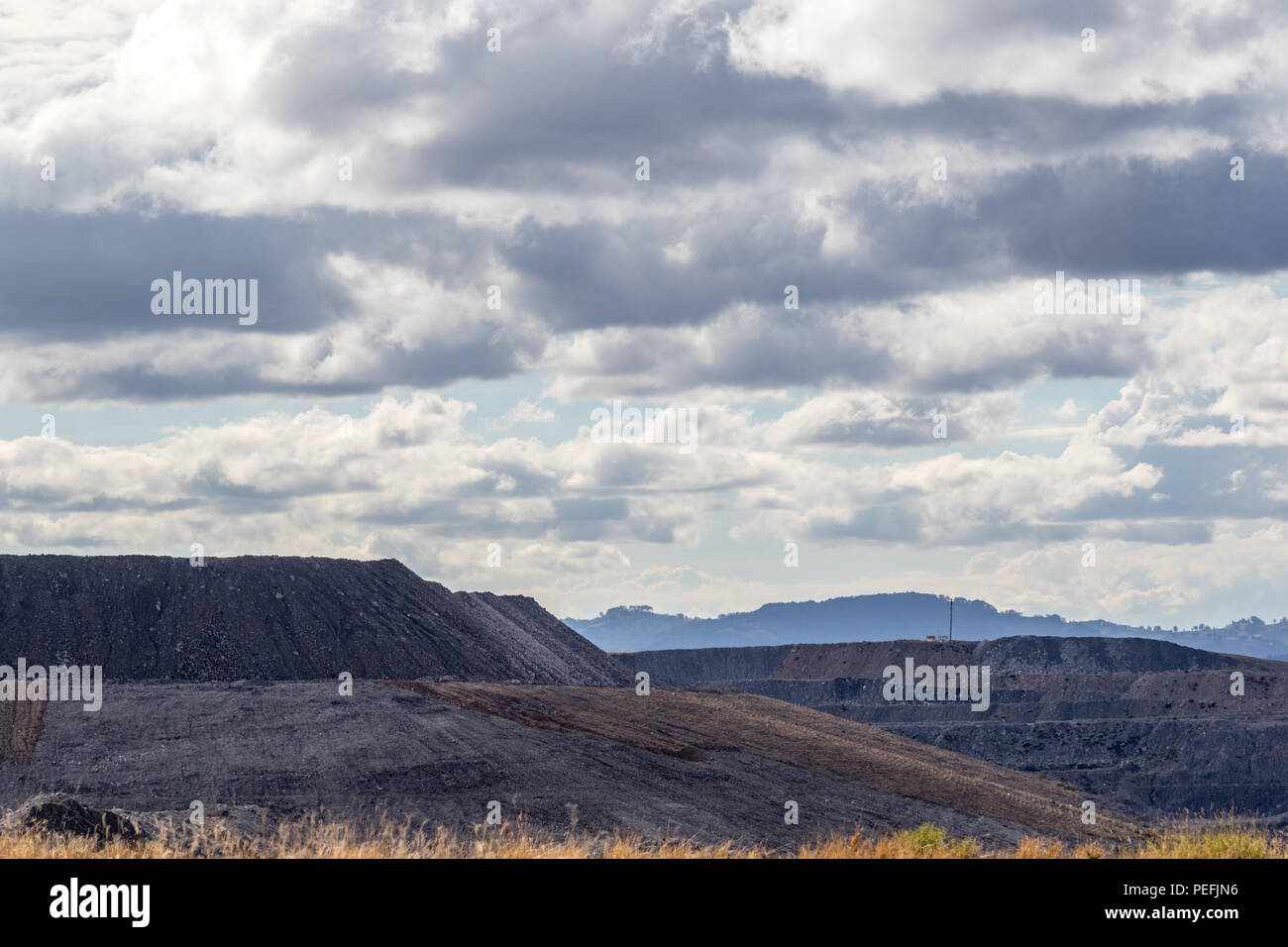 View of coal mine against farmland and regeneration area Stock Photo ...