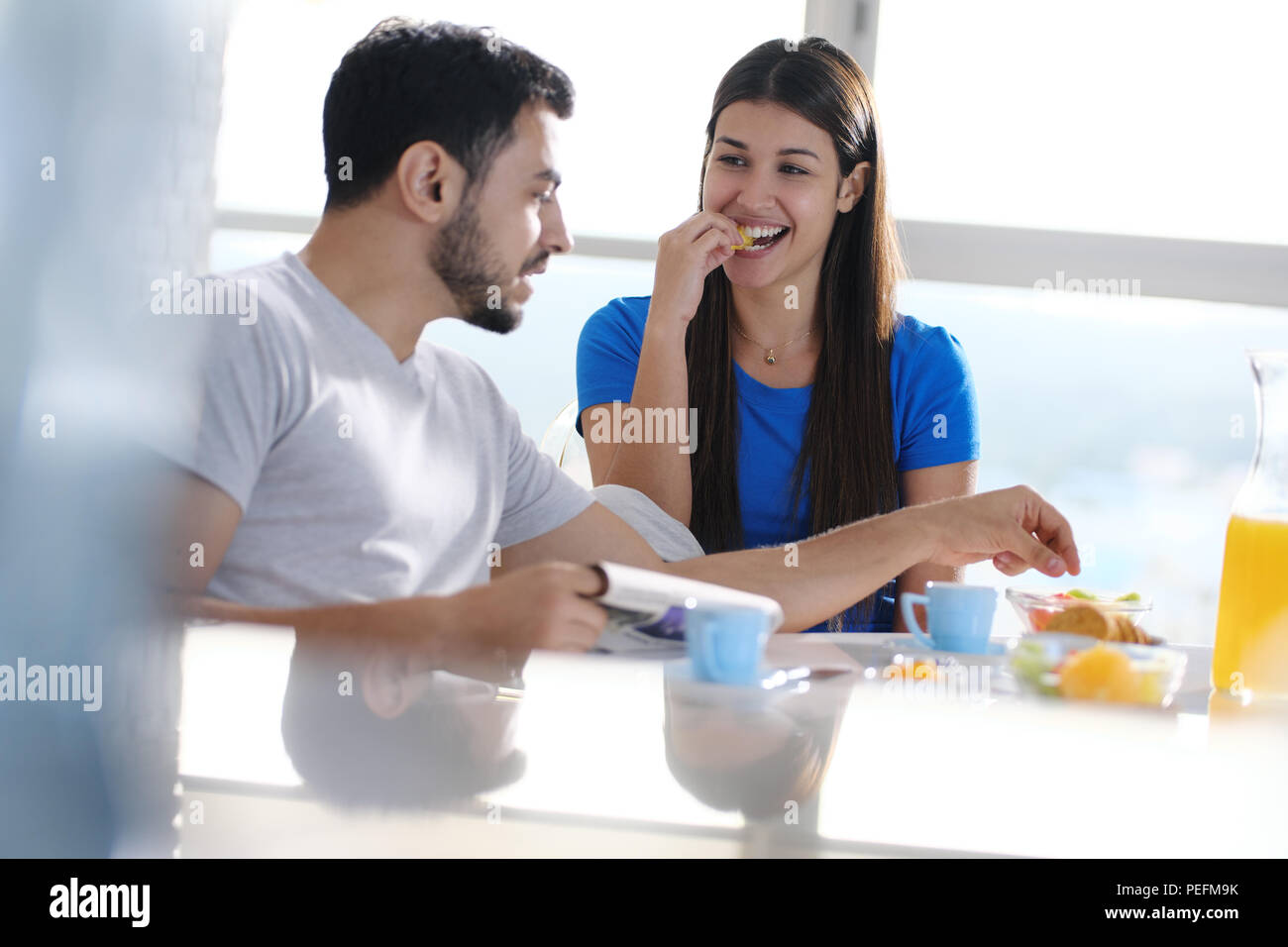 Hispanic family sitting table eating hi-res stock photography and ...
