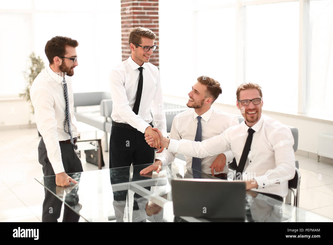 handshake colleagues in the workplace.photo with copy space Stock Photo ...