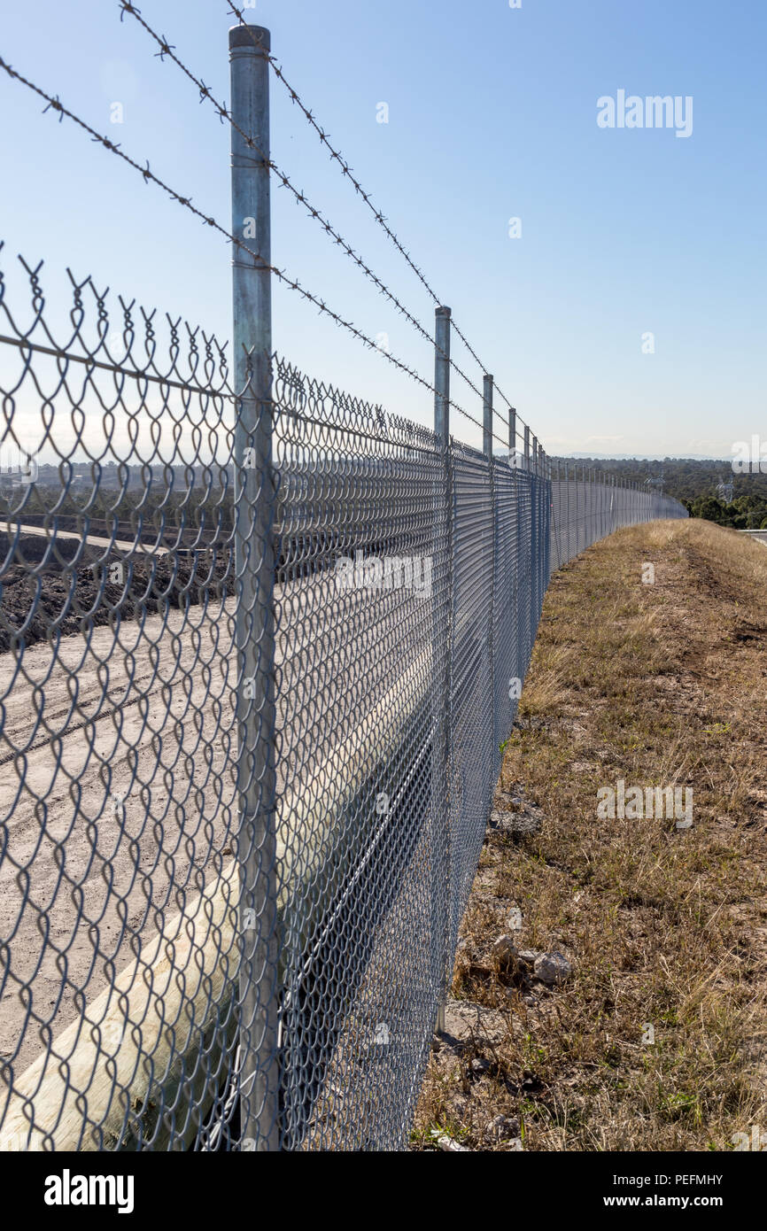 Blue sky over fence hi-res stock photography and images - Alamy