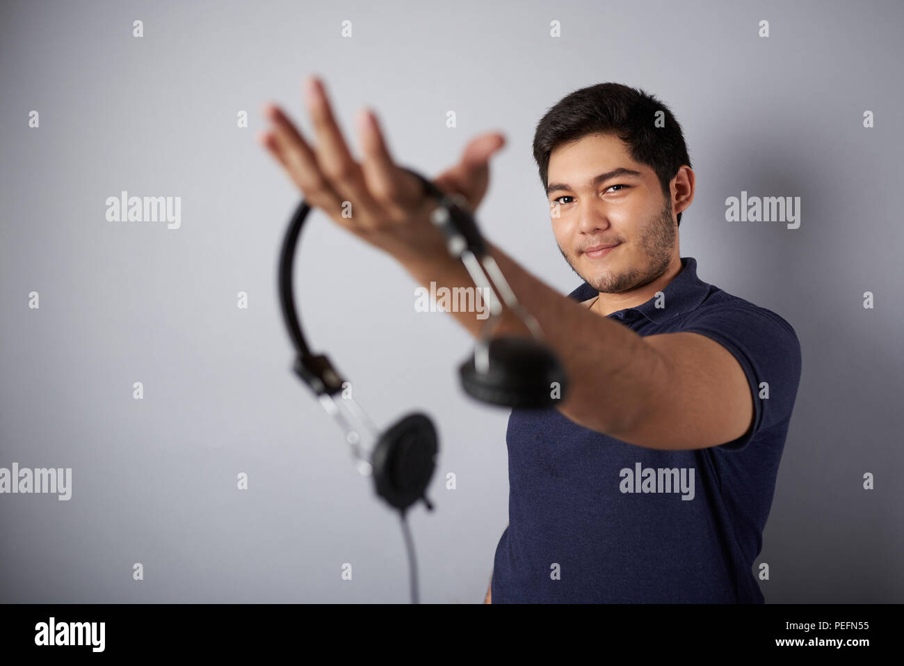 Man with earphones hi-res stock photography and images - Alamy