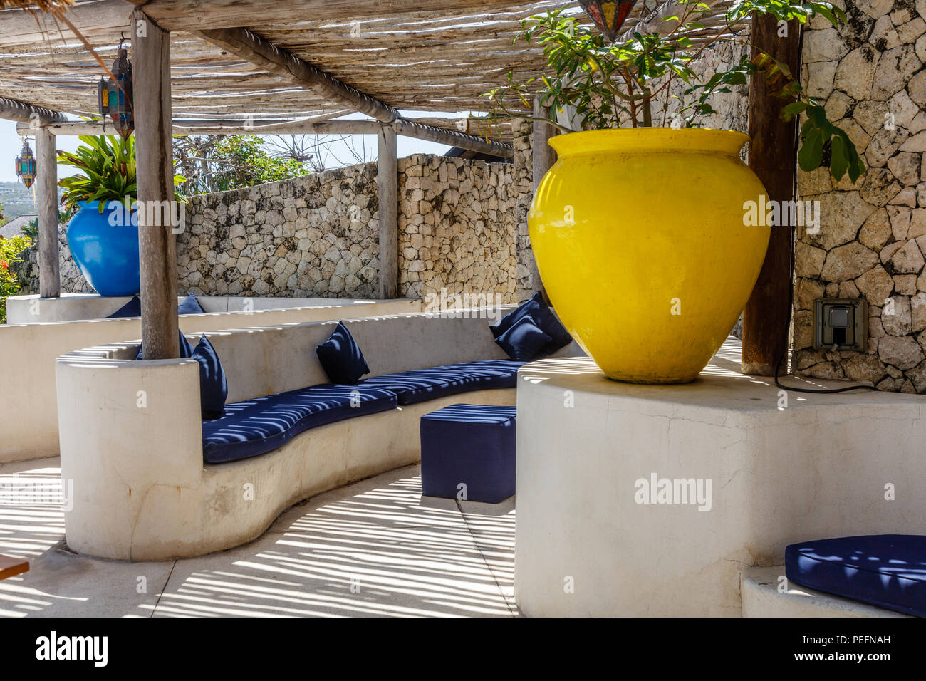 Mediterranean style interior in yellow, white and blue colors with ...