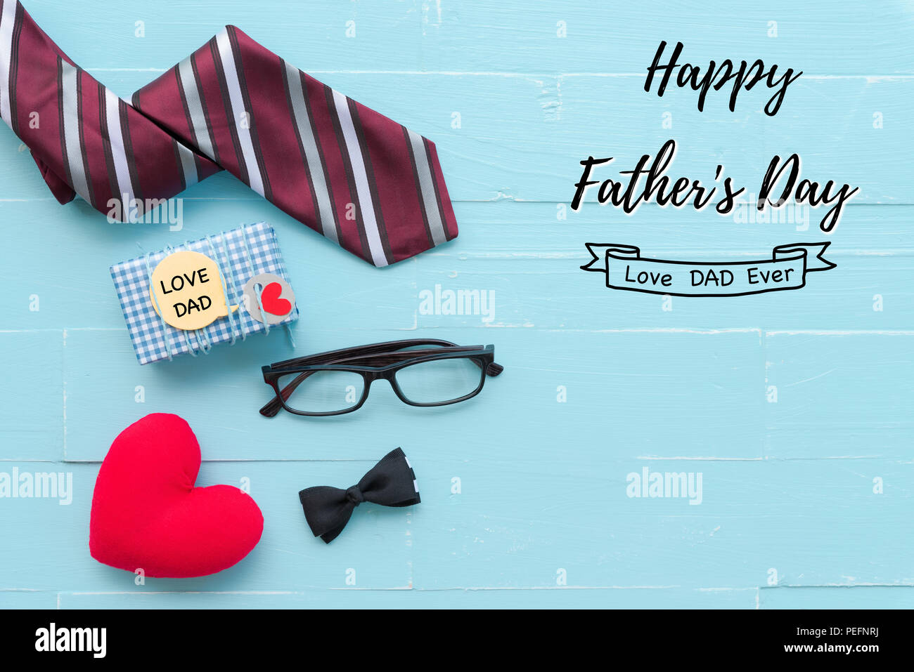 Happy fathers day concept. Red tie, glasses, gift box with LOVE DAD ...