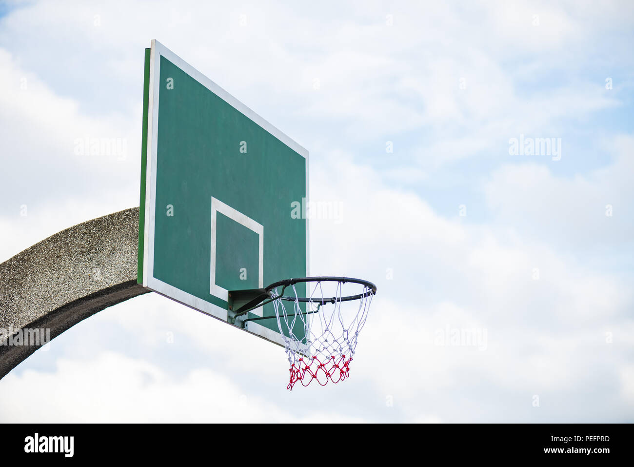 Basketball board with hoop net on blue sky white cloud Stock Photo - Alamy