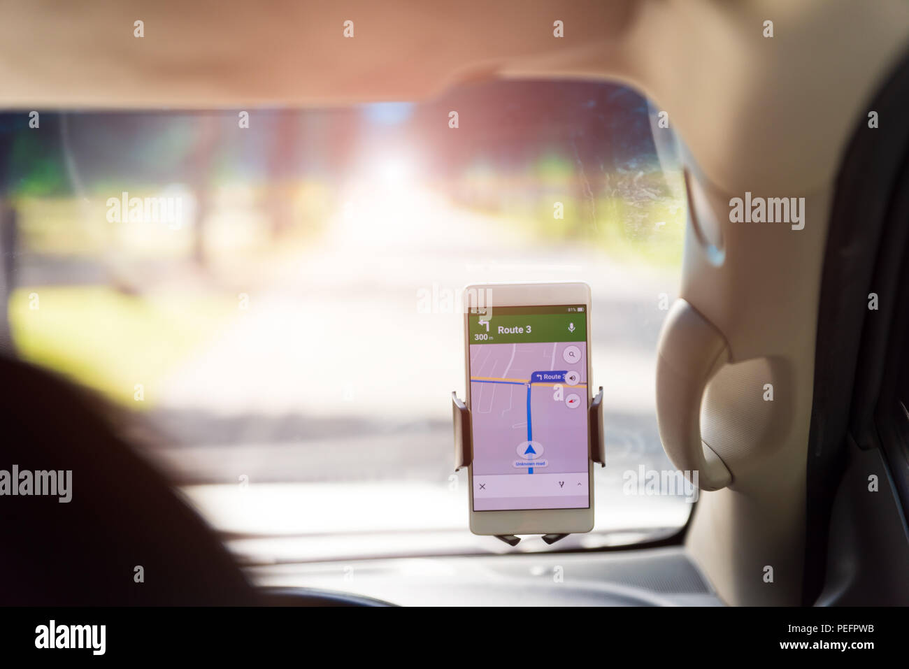 mobile phone with map gps navigation in car. toned at sunset Stock ...