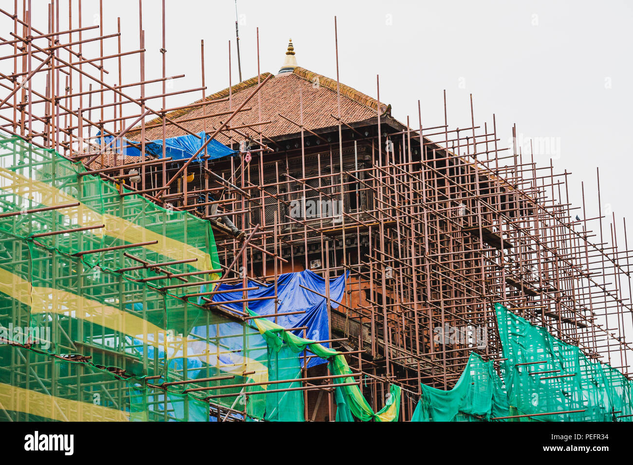 Building renovation scaffolding. Building is under construction, metal ...