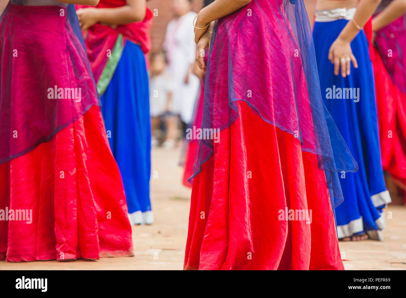 Bollywood Dancers with colorful dress in a row,Ready to dance position ...