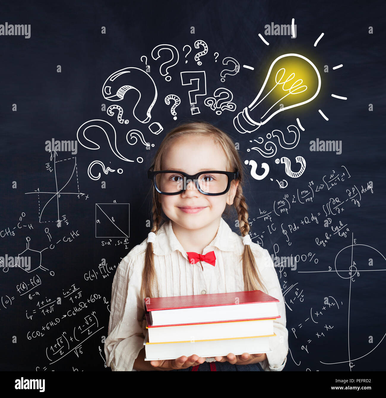 Elementary school student girl with proud expression showing his ideas ...