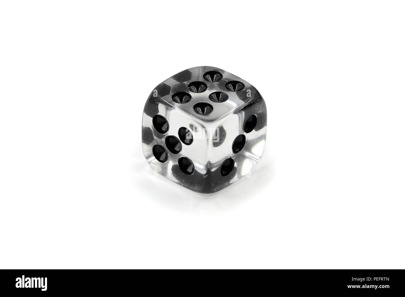 Glass dice close up isolated on white Stock Photo - Alamy