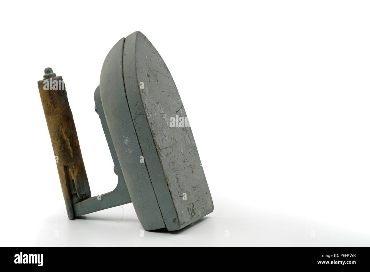 Old dusty iron isolated on white background Stock Photo - Alamy