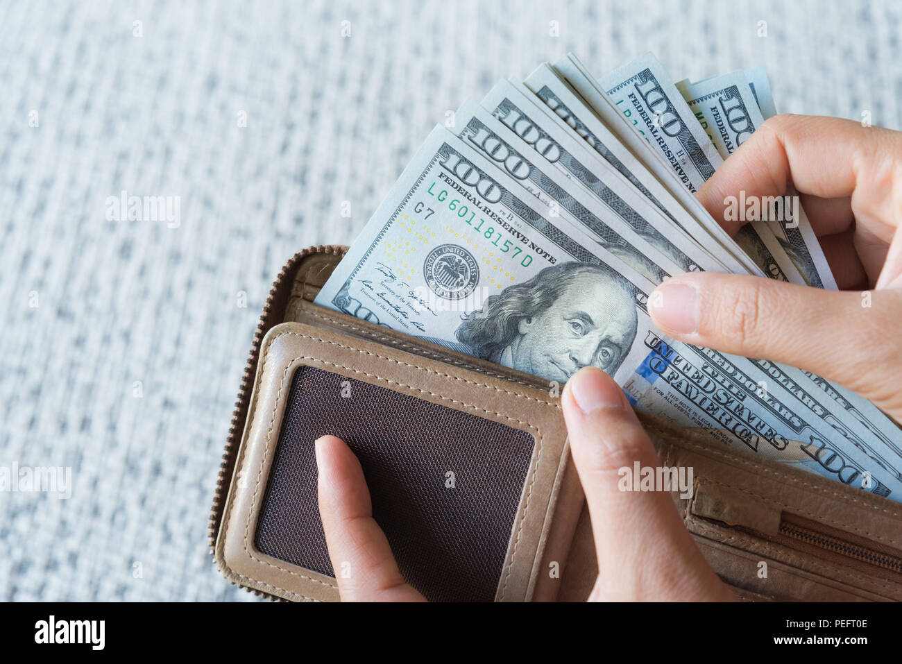 African female hand holding banknote hi-res stock photography and ...