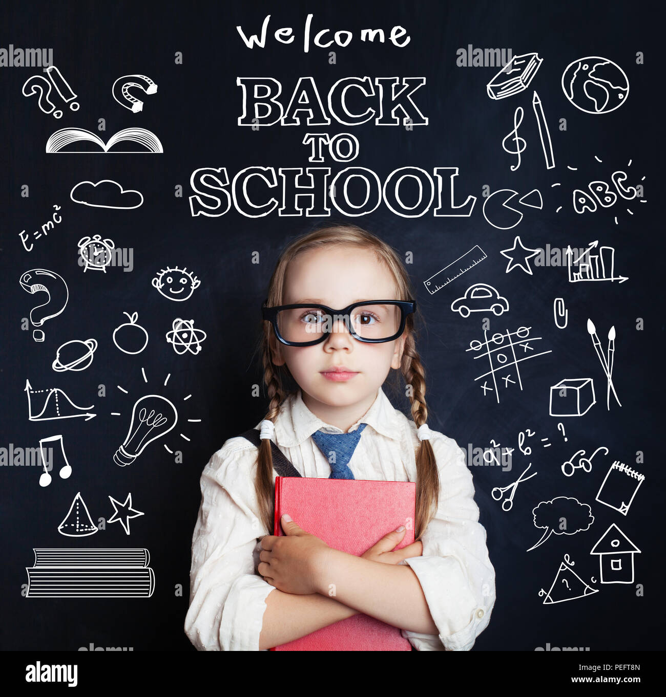 Cute little girl student portrait. Pupil child in classroom on ...