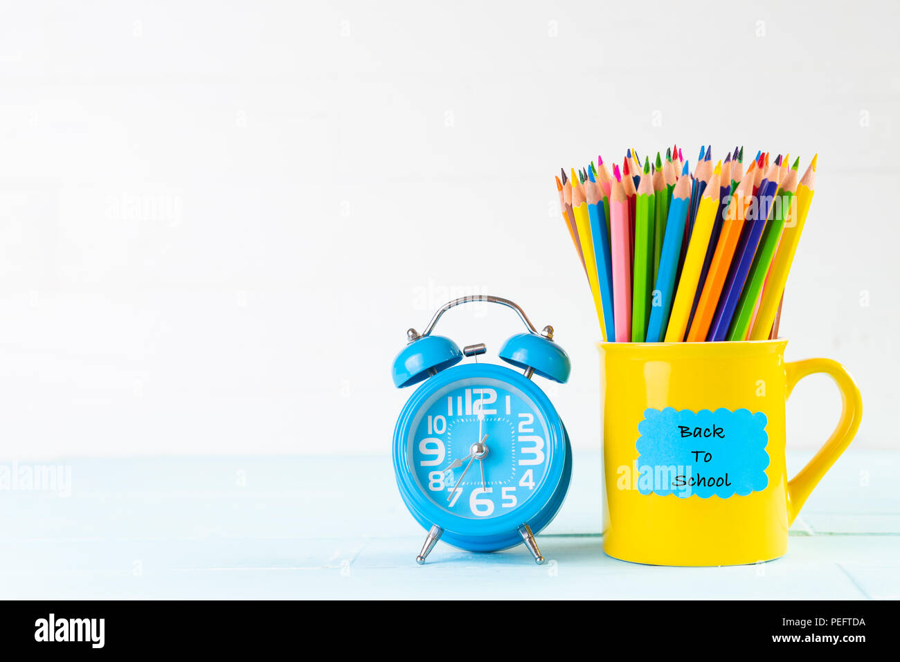Education or back to school Concept. school office supplies. alarm ...