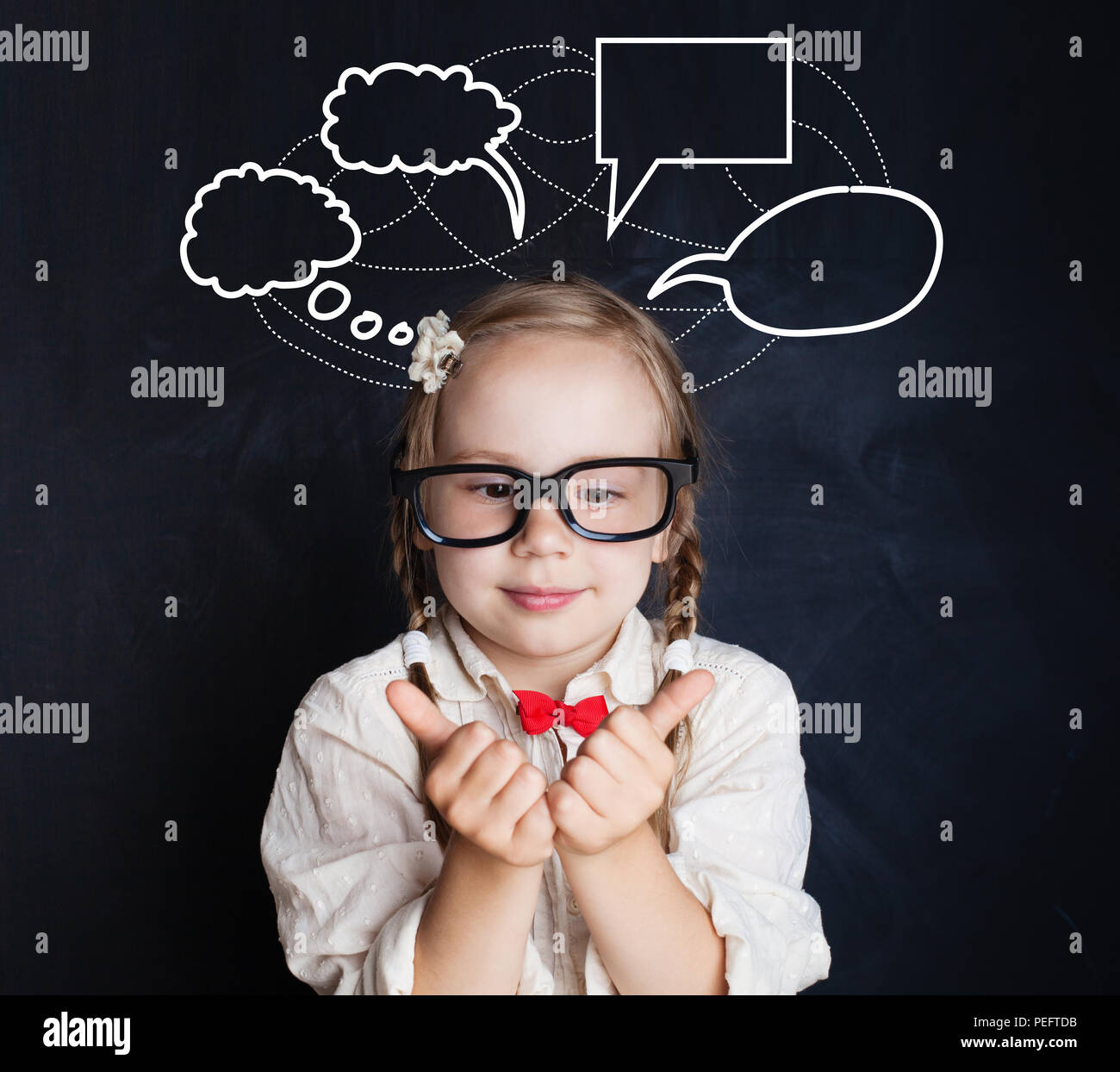 Child little girl showing right and left hands against empty speech ...