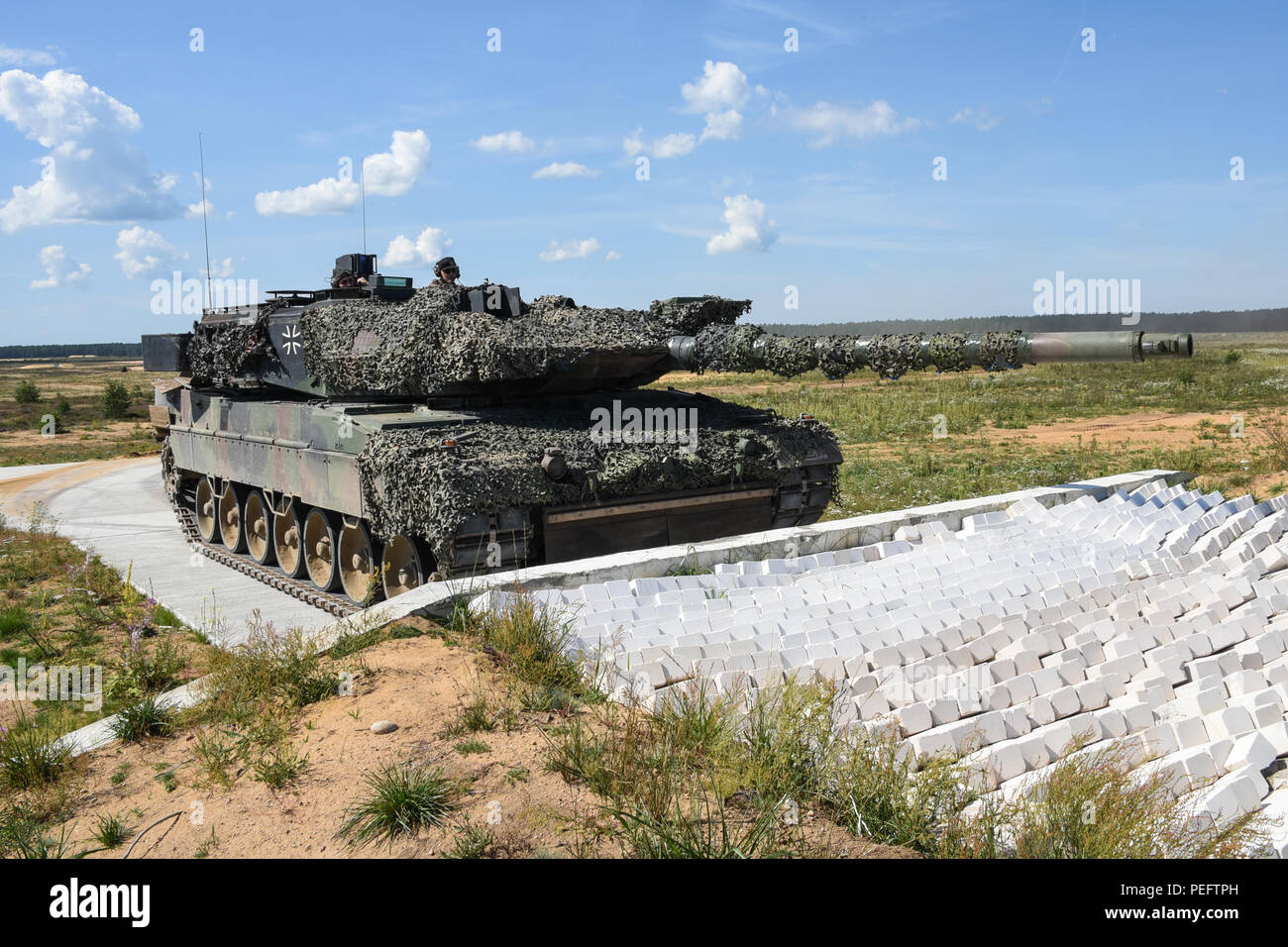 German Army soldiers occupy a firing position in a Leopard 2 main ...