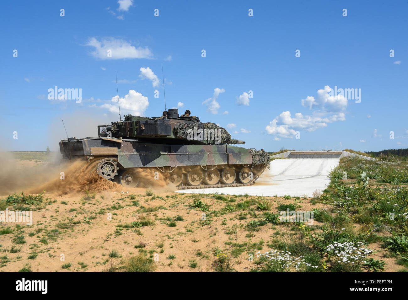 German Army soldiers occupy a firing position in a Leopard 2 main ...