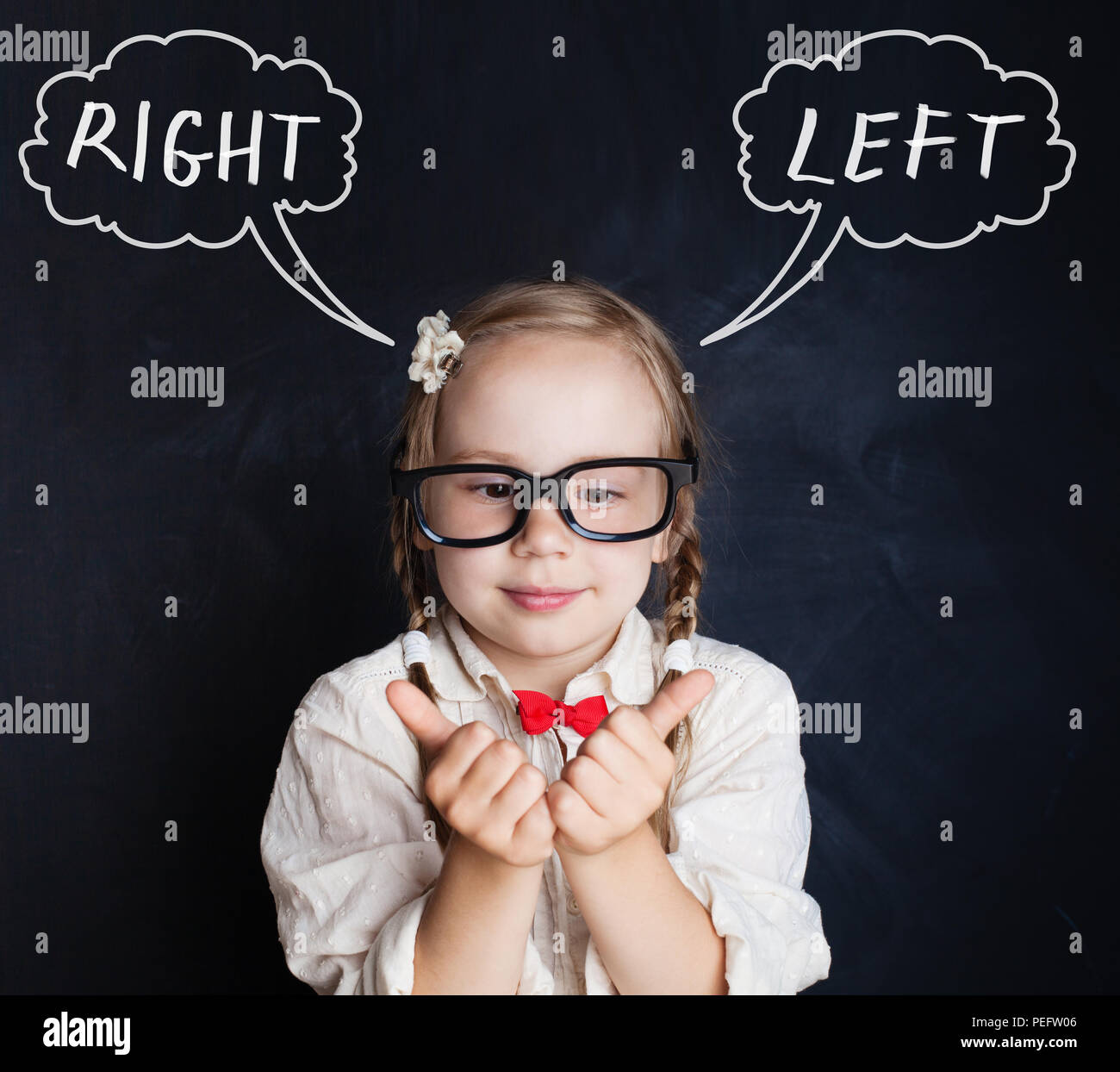 Little child and right and left hands. Funny girl on speech clouds ...