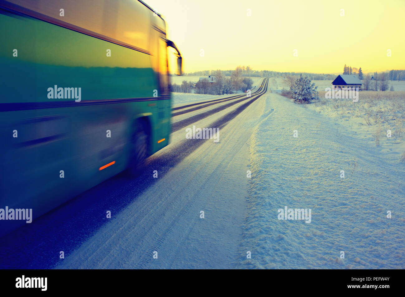 Bus driving in the snow hi-res stock photography and images - Alamy