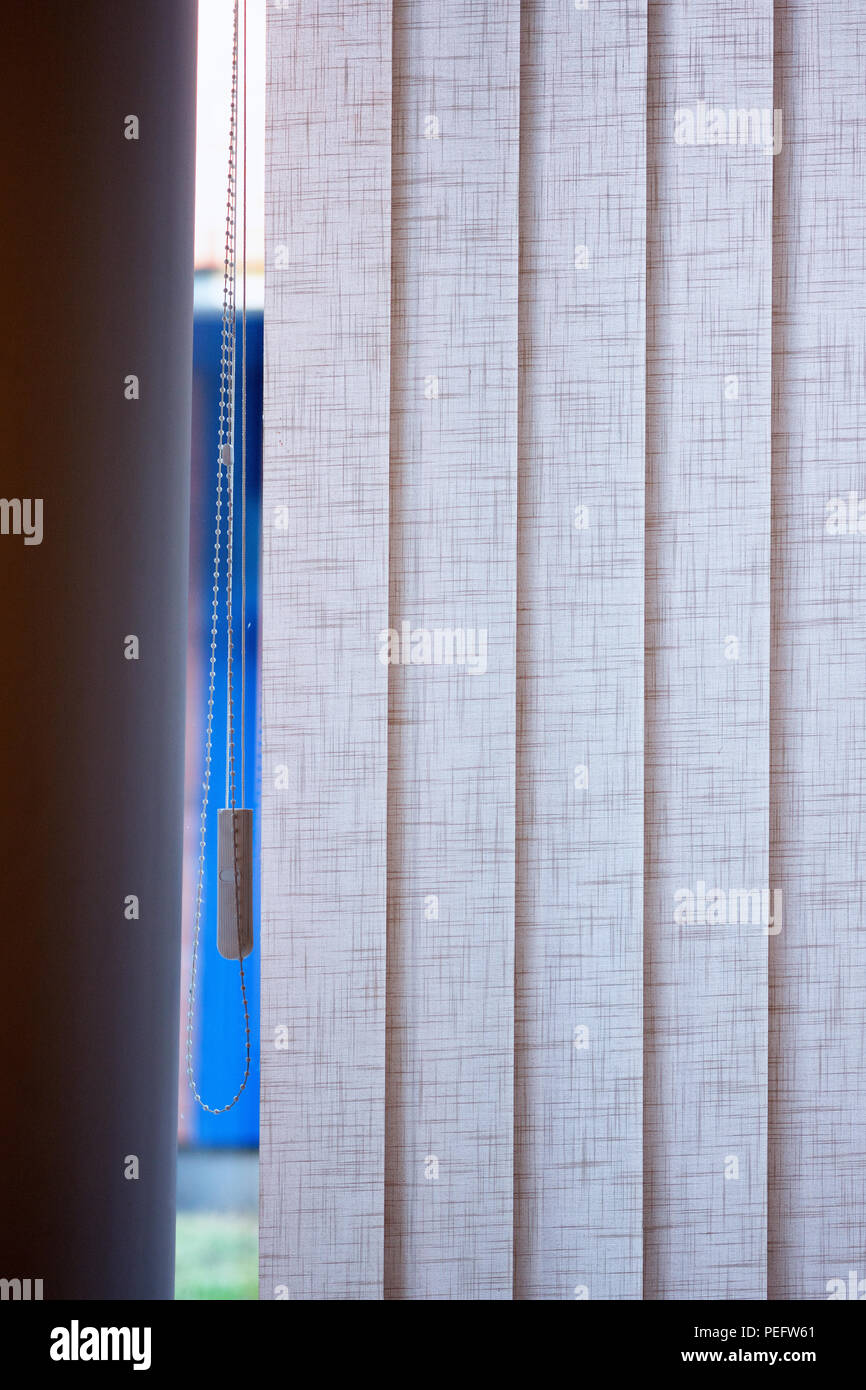 Vertical sunblinds with an abstract pattern and a mechanism to close ...