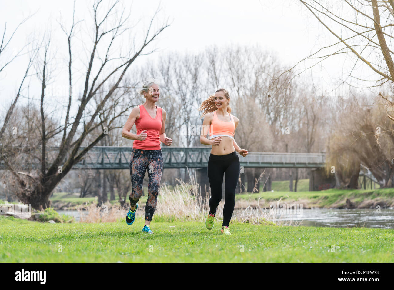 Fitness woman running in spring hi-res stock photography and images - Alamy