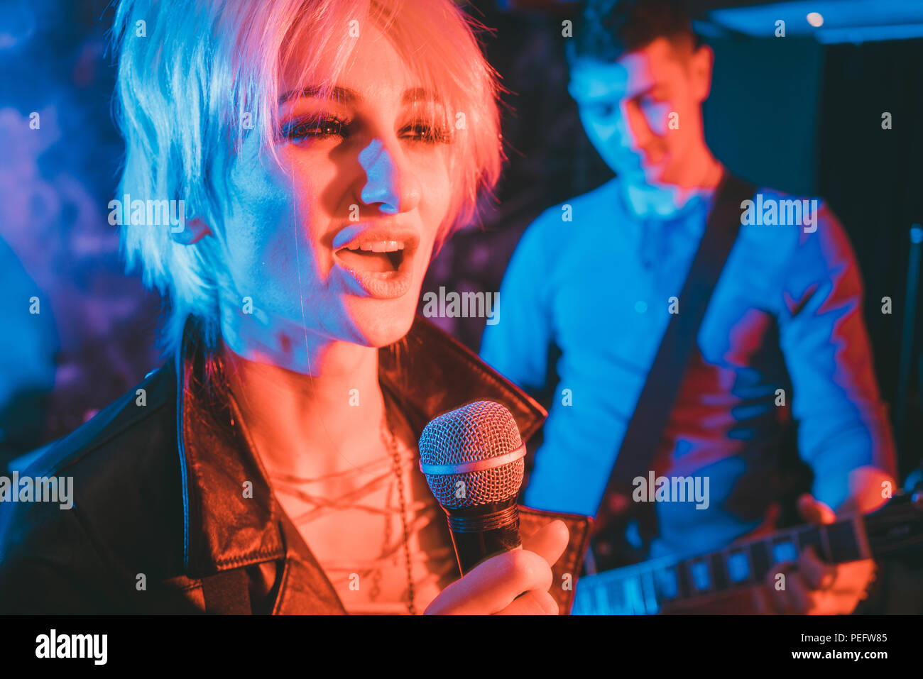 Singer man woman band singing hi-res stock photography and images - Alamy