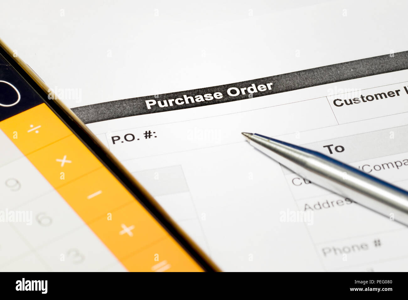 Purchasing order document, calculator and pen Stock Photo - Alamy