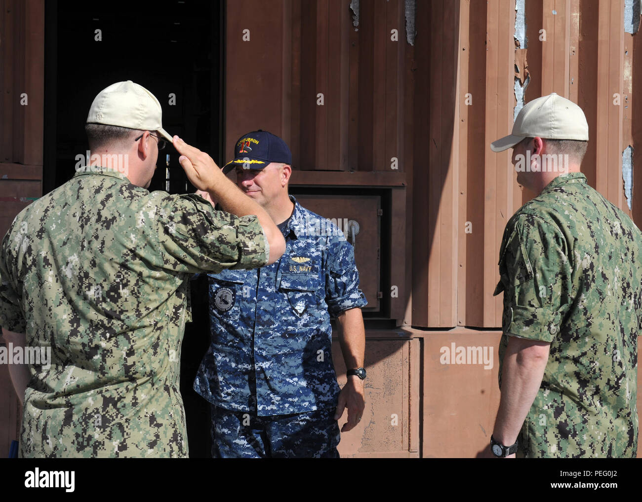 SAN DIEGO (Aug. 14, 2015) Capt. Andrew Kimsey reports to Capt. Gene ...