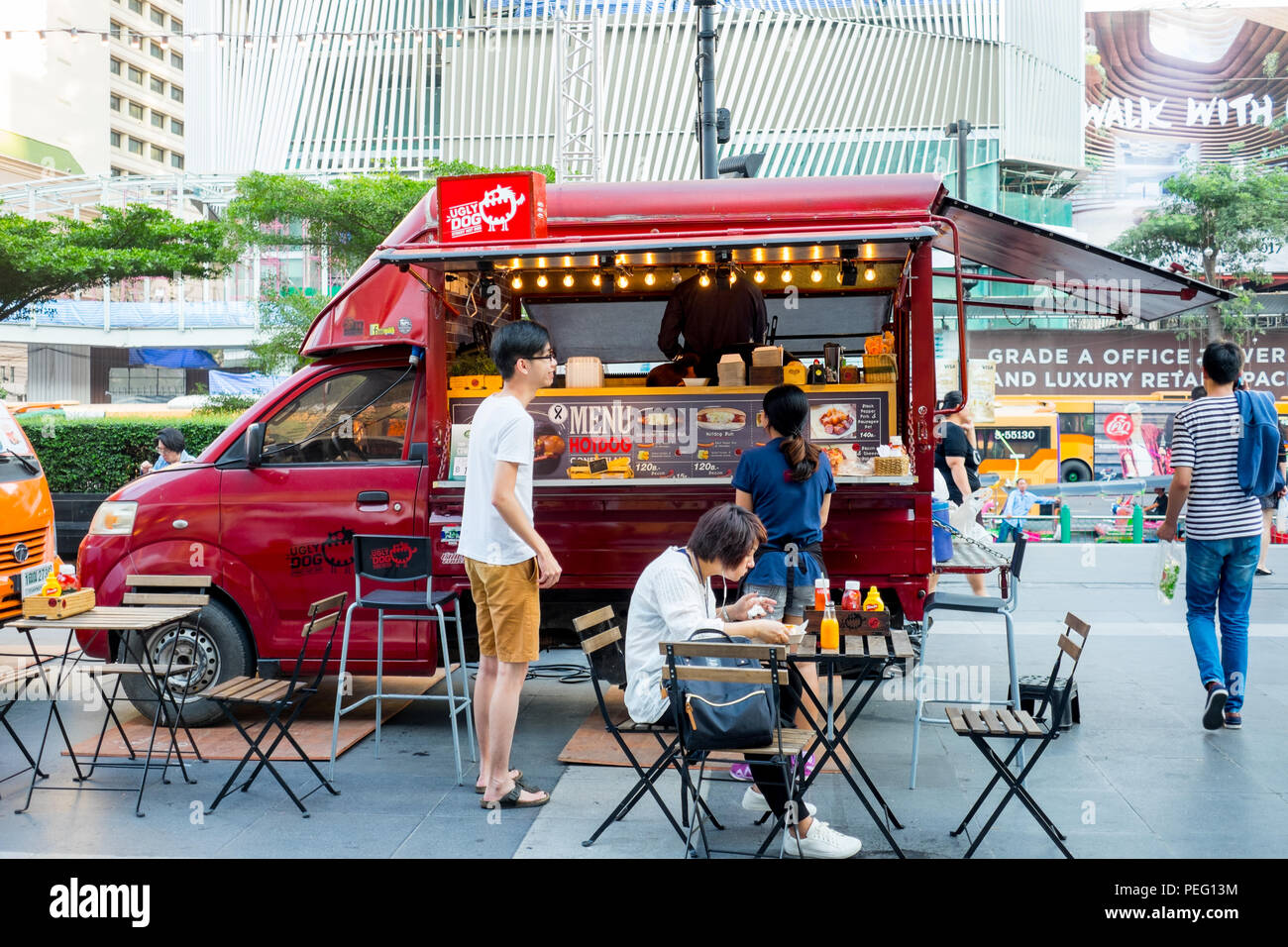 Bangkok, Thailand - December 18, 2016 : People enjoy eating hotdog from ...