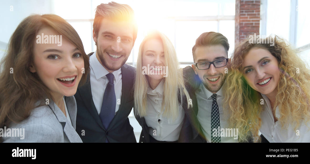 closeup.happy business team looking at camera Stock Photo - Alamy